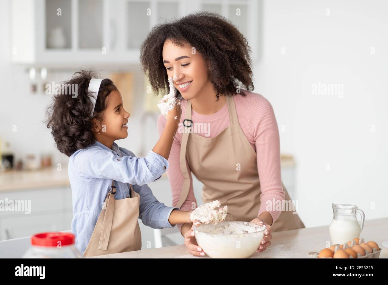 Black kid cooking hi-res stock photography and images - Alamy