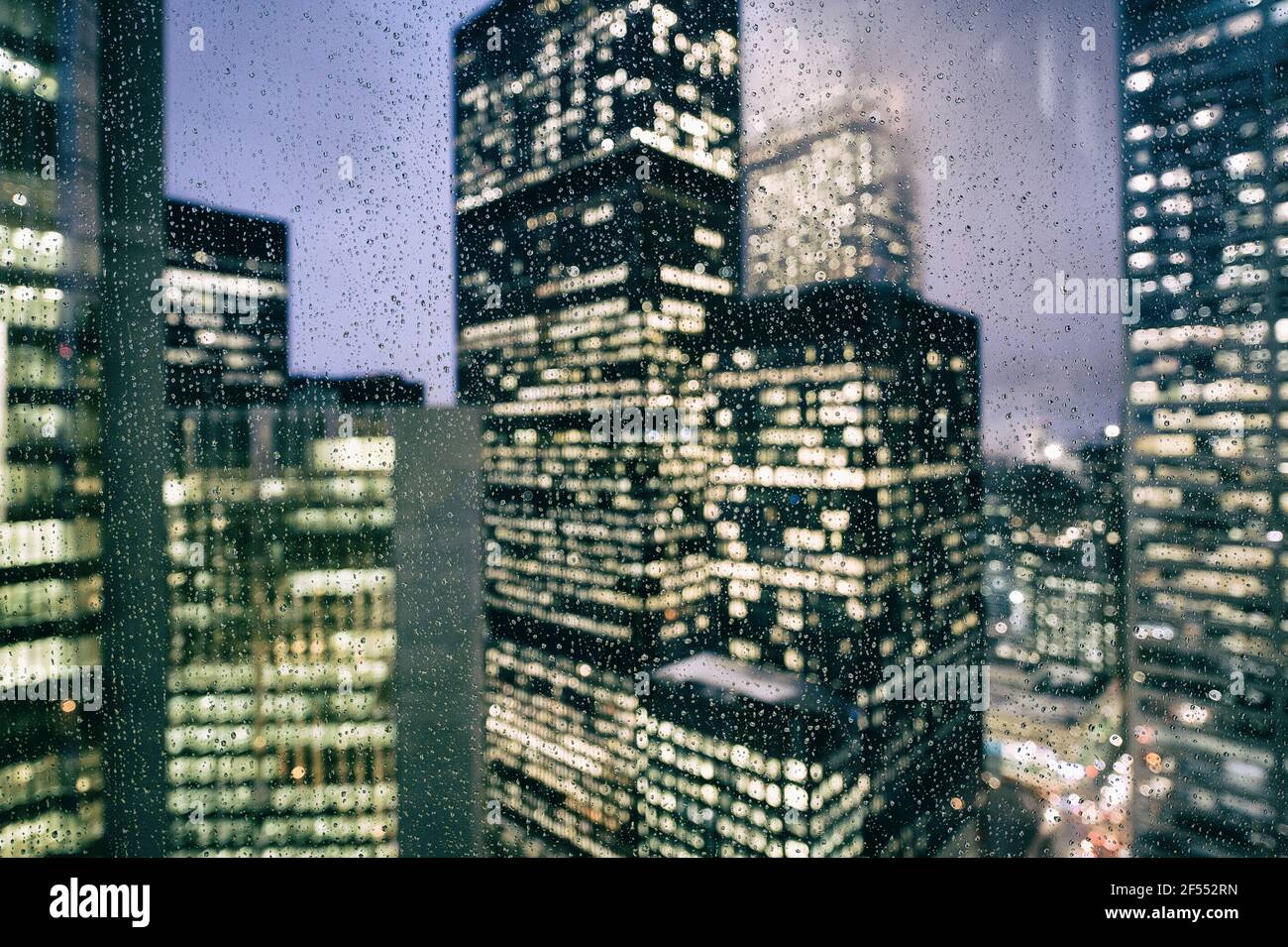 Downtown lights in the rain Stock Photo - Alamy