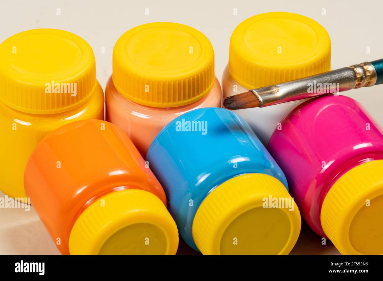 3 tubes of gouache paint lined up and lying down Stock Photo - Alamy