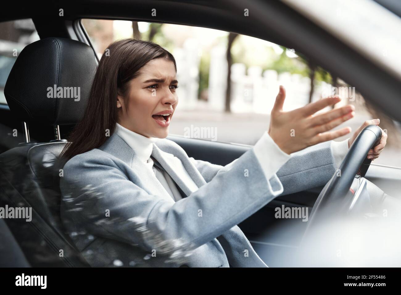 Attractive female driver stuck in hi-res stock photography and images ...