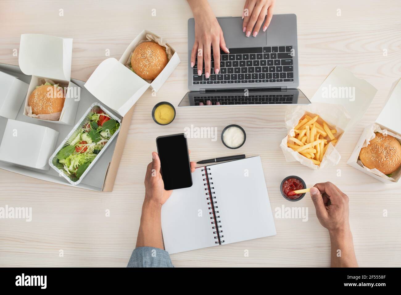 Top view young couple burgers hi-res stock photography and images - Alamy