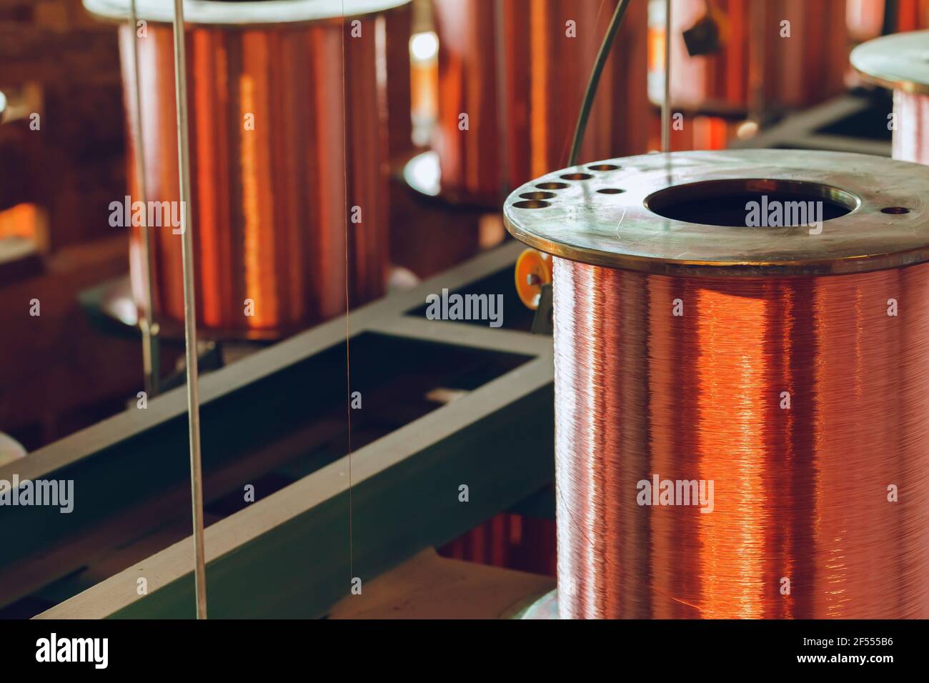 Copper wire reels in cable factory close up Stock Photo - Alamy