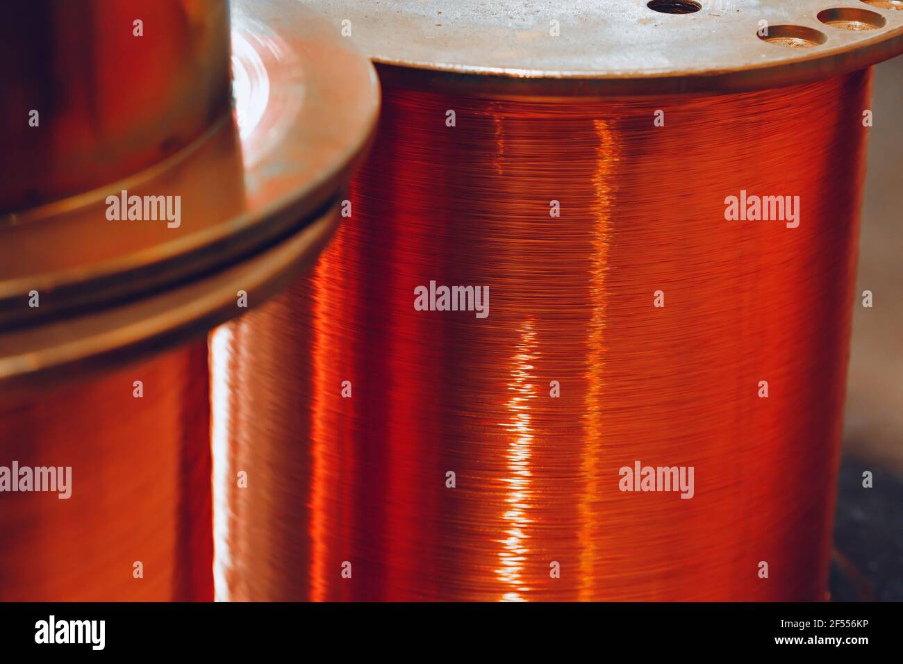 Copper wire reels in cable factory close up Stock Photo - Alamy
