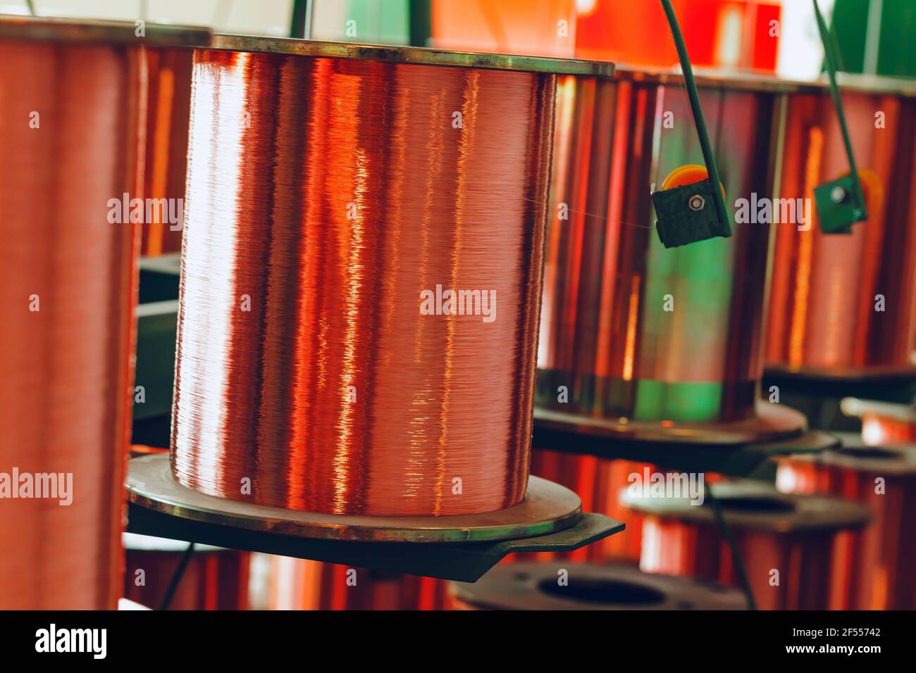 Copper wire reels in cable factory close up Stock Photo - Alamy