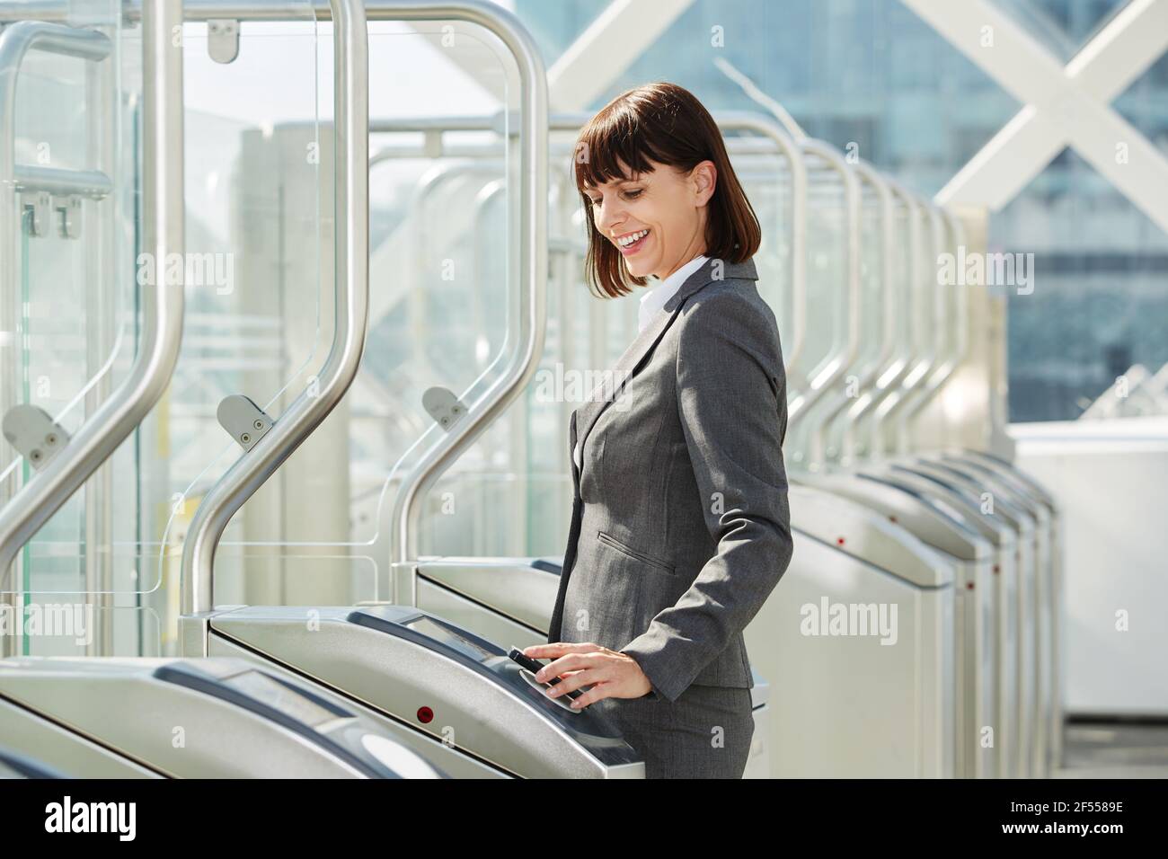 Woman walking by platform hi-res stock photography and images - Alamy
