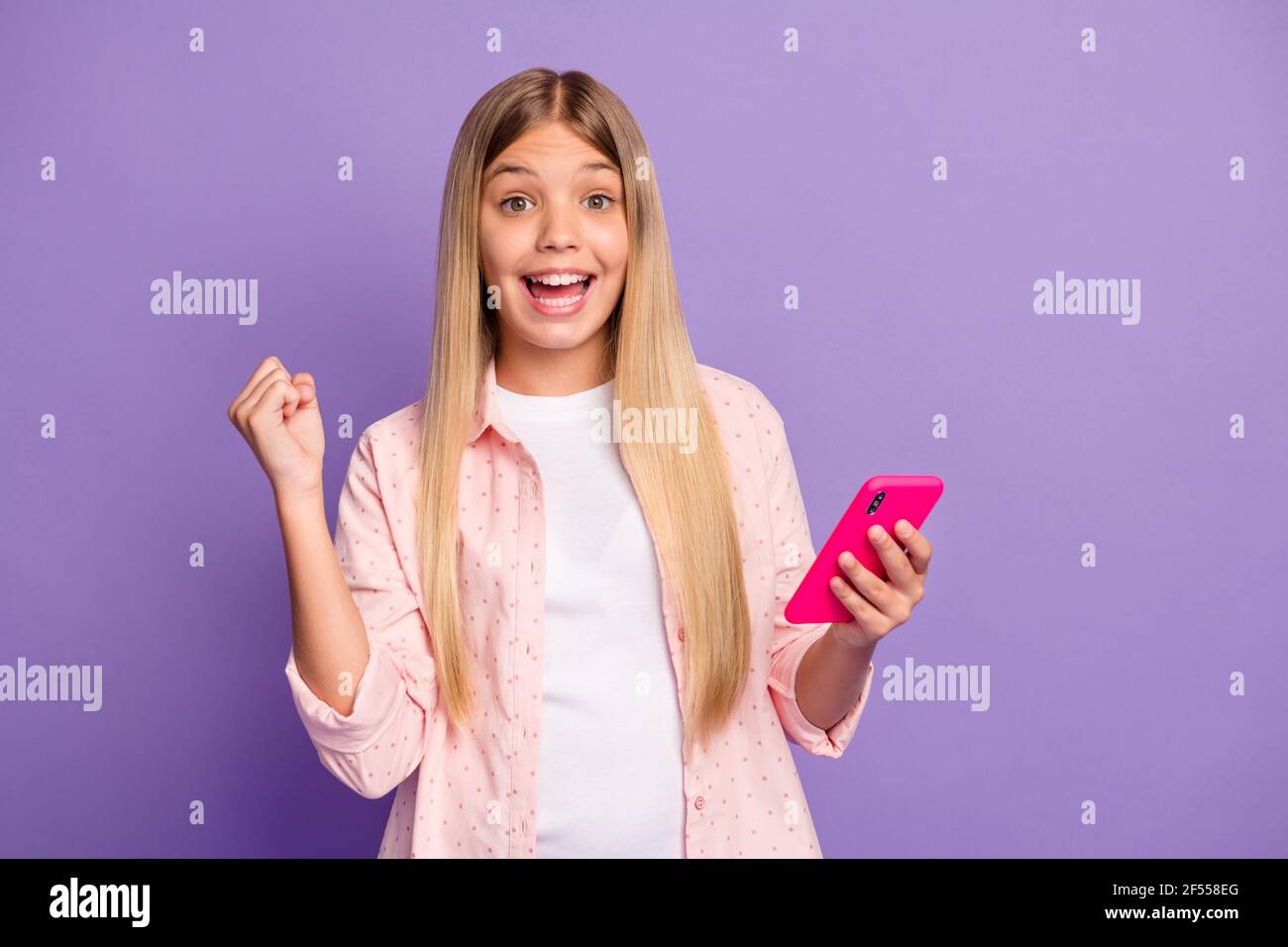 Photo of optimistic long hairdo pretty girl hold telephone hand fist ...