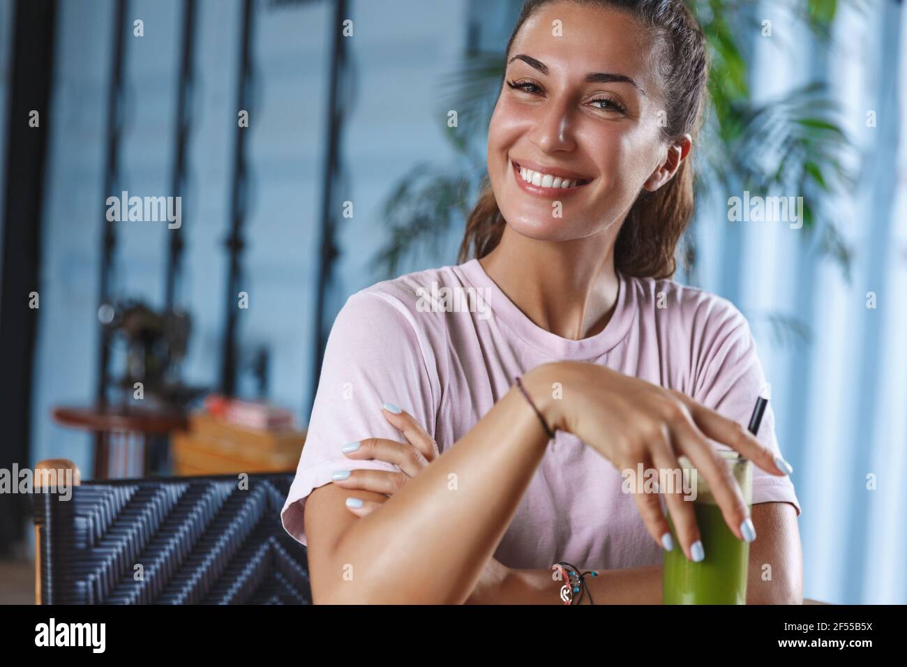 Close-up portrait of satisfied, happy relaxed female travel blogger ...