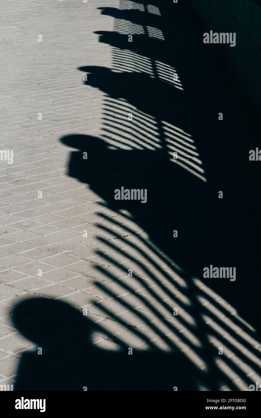 Shadow of the fence against the light creates beautiful spaces on the ...