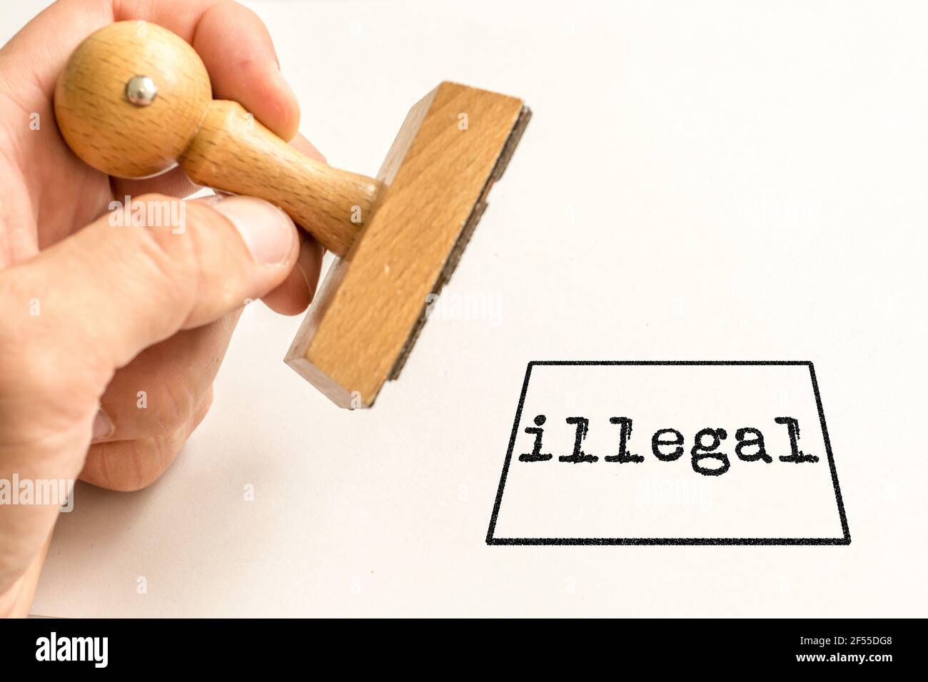 Illegal stamp on a white background Stock Photo - Alamy