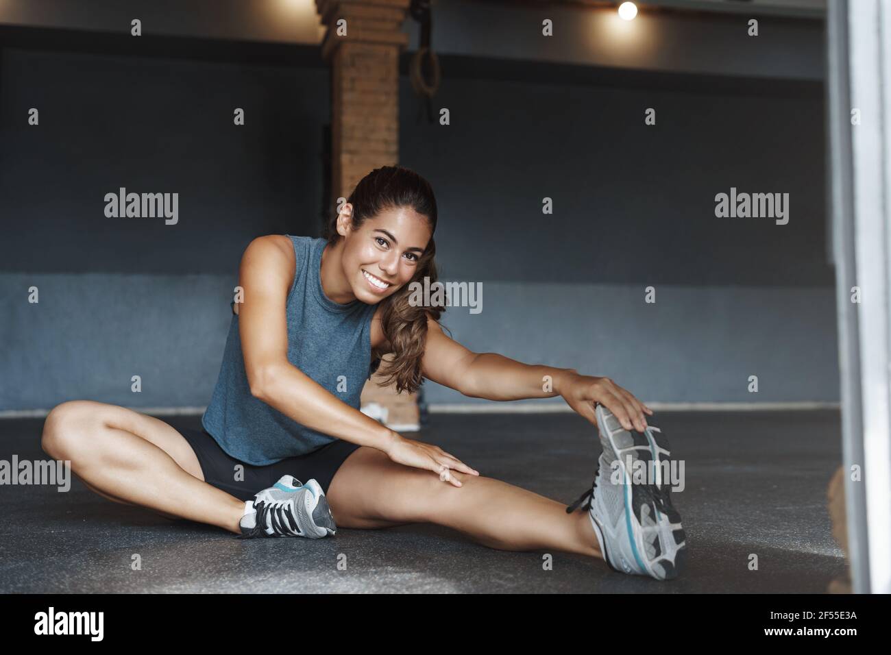 Workout, training and sport concept. Attractive strong young ...