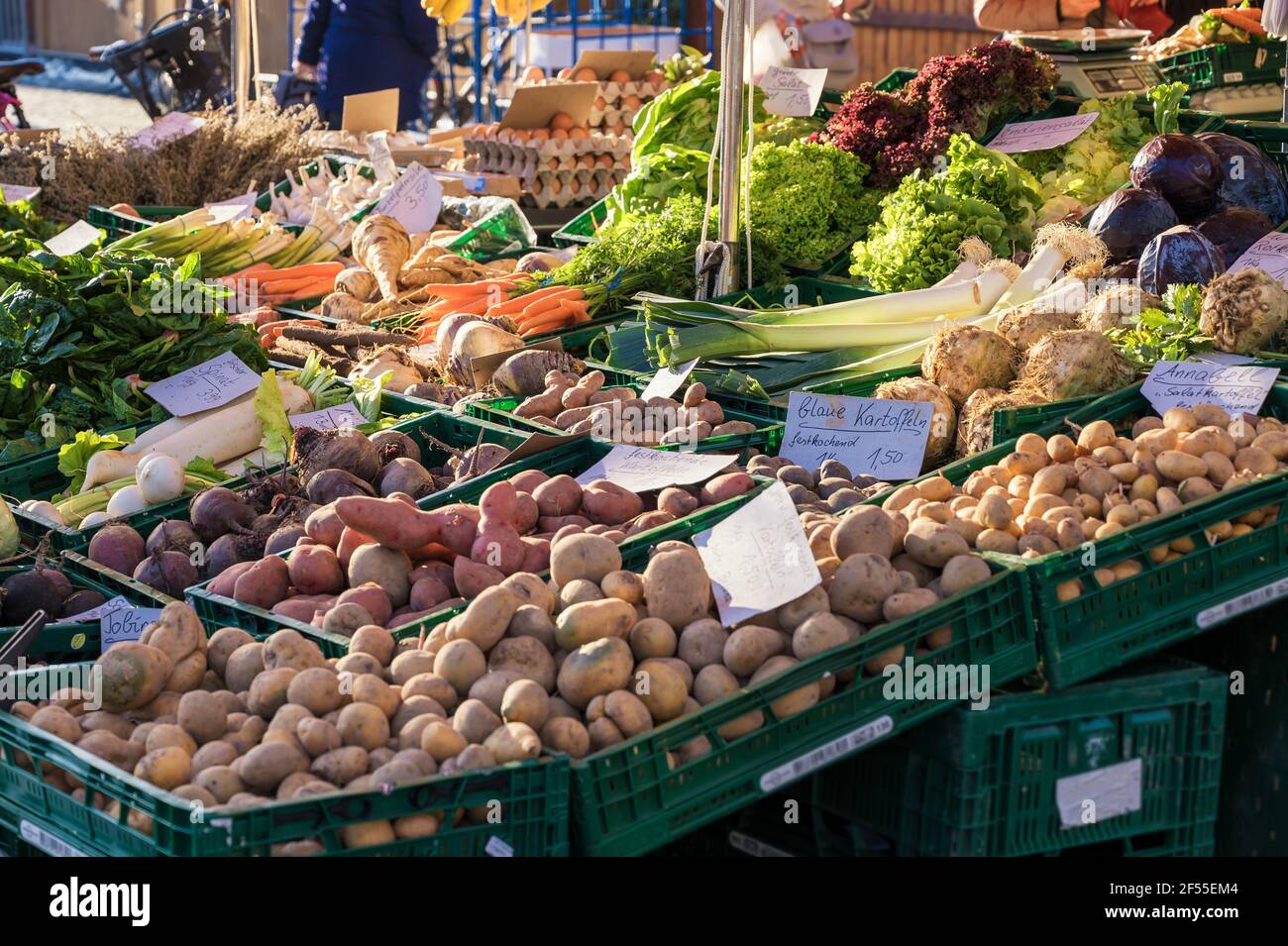 Fruit and vegetable stand with fresh regional products and price tags ...