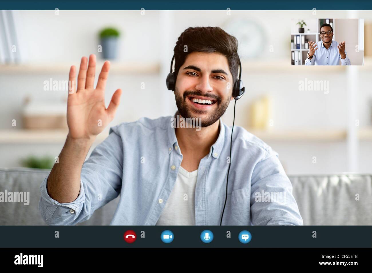 Remote distant communication. Arab man in headphones having video ...