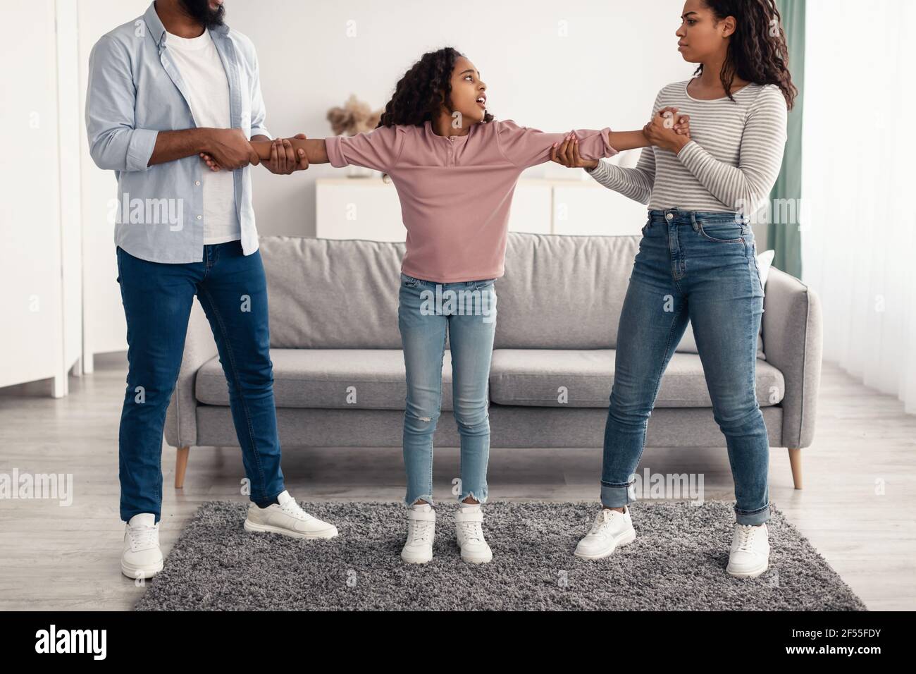 Divorce. Angry black parents fighting over their child Stock Photo - Alamy Divorce. Angry black parents fighting over their child Stock Photo - Alamy