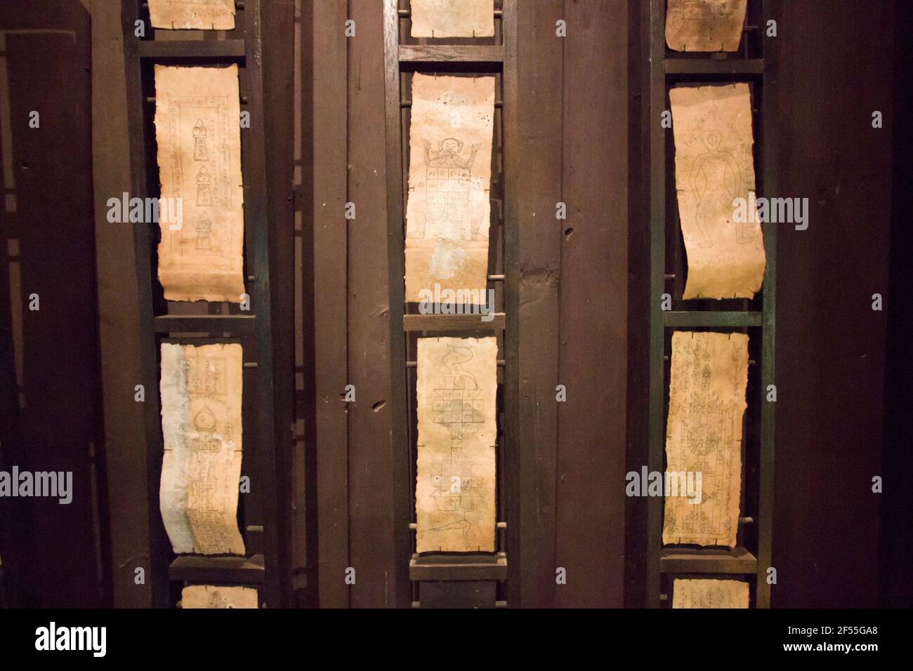 Original handicraft art drawings on display in a room at Kamthieng ...