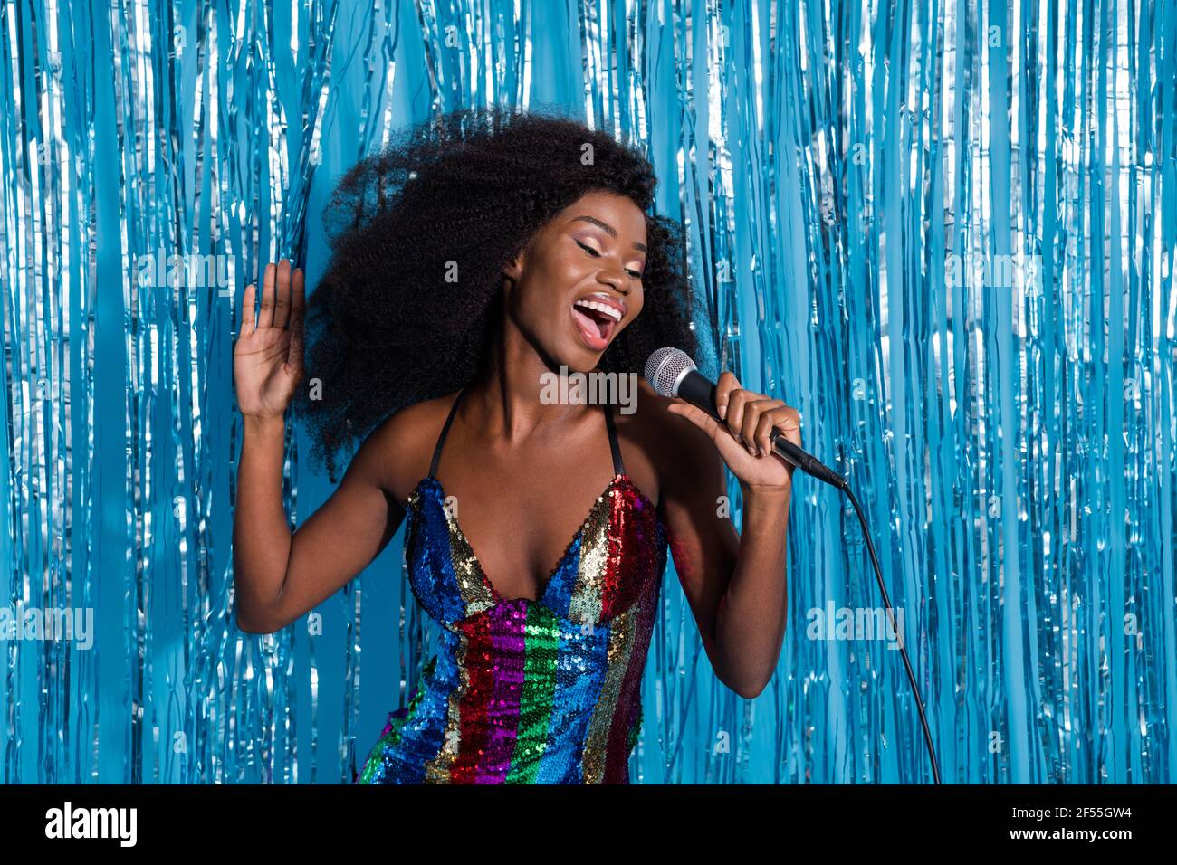 Portrait of attractive cheerful girl celebrity singing festal concert ...