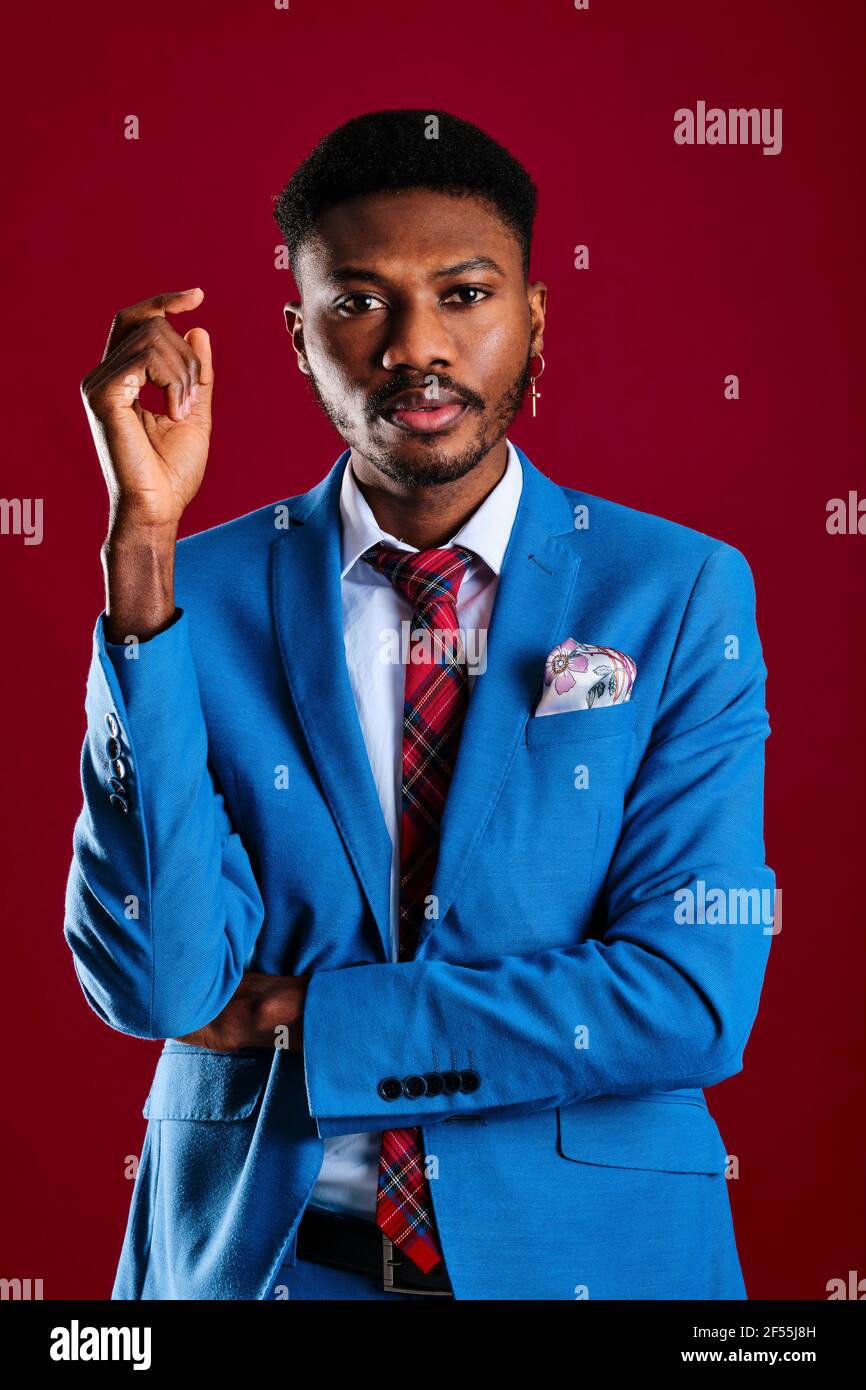 Red and blue suit hi-res stock photography and images - Alamy