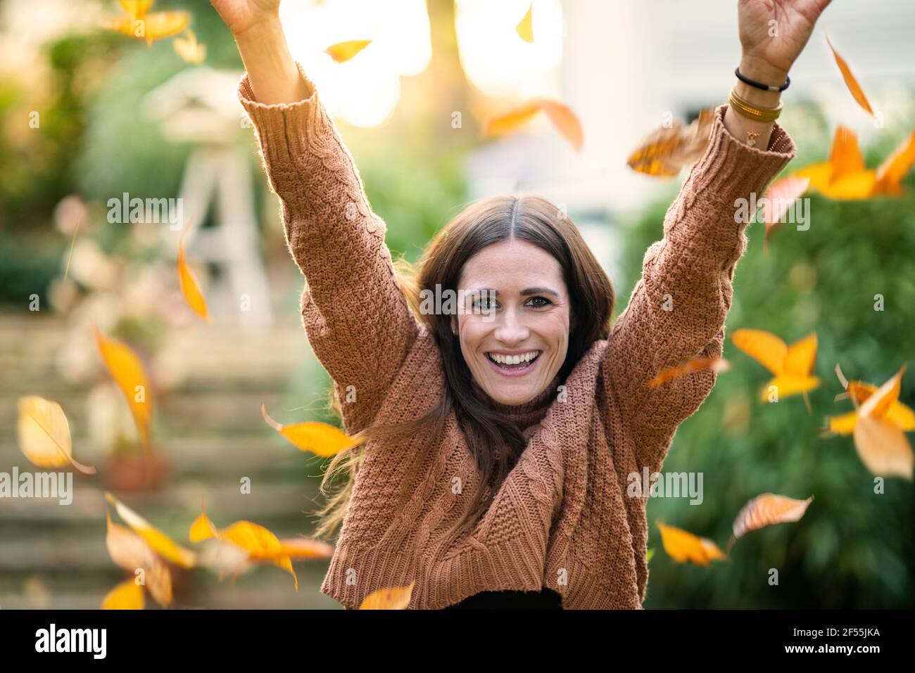 Sunlight woman leaves hi-res stock photography and images - Alamy