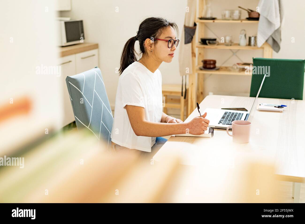 Asian woman sitting table working hi-res stock photography and images ...