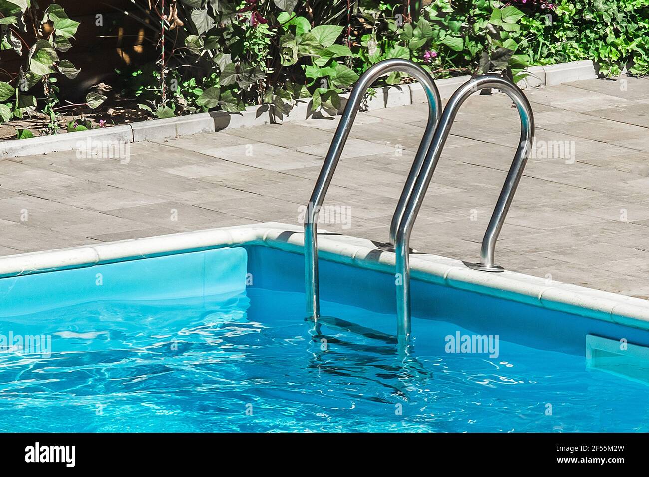 Pool handrails hi-res stock photography and images - Alamy