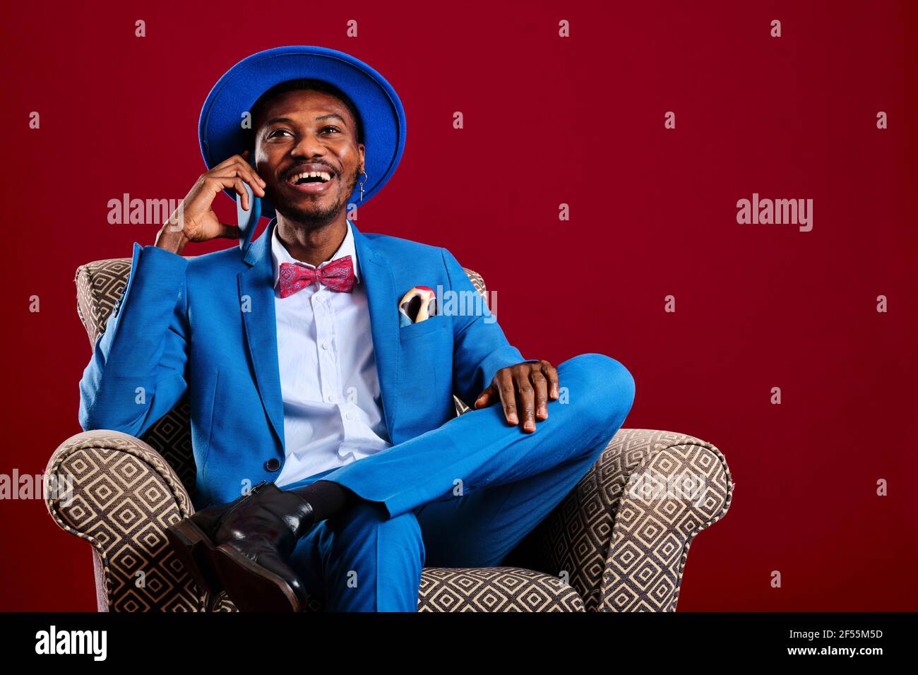Man red chair hi-res stock photography and images - Alamy
