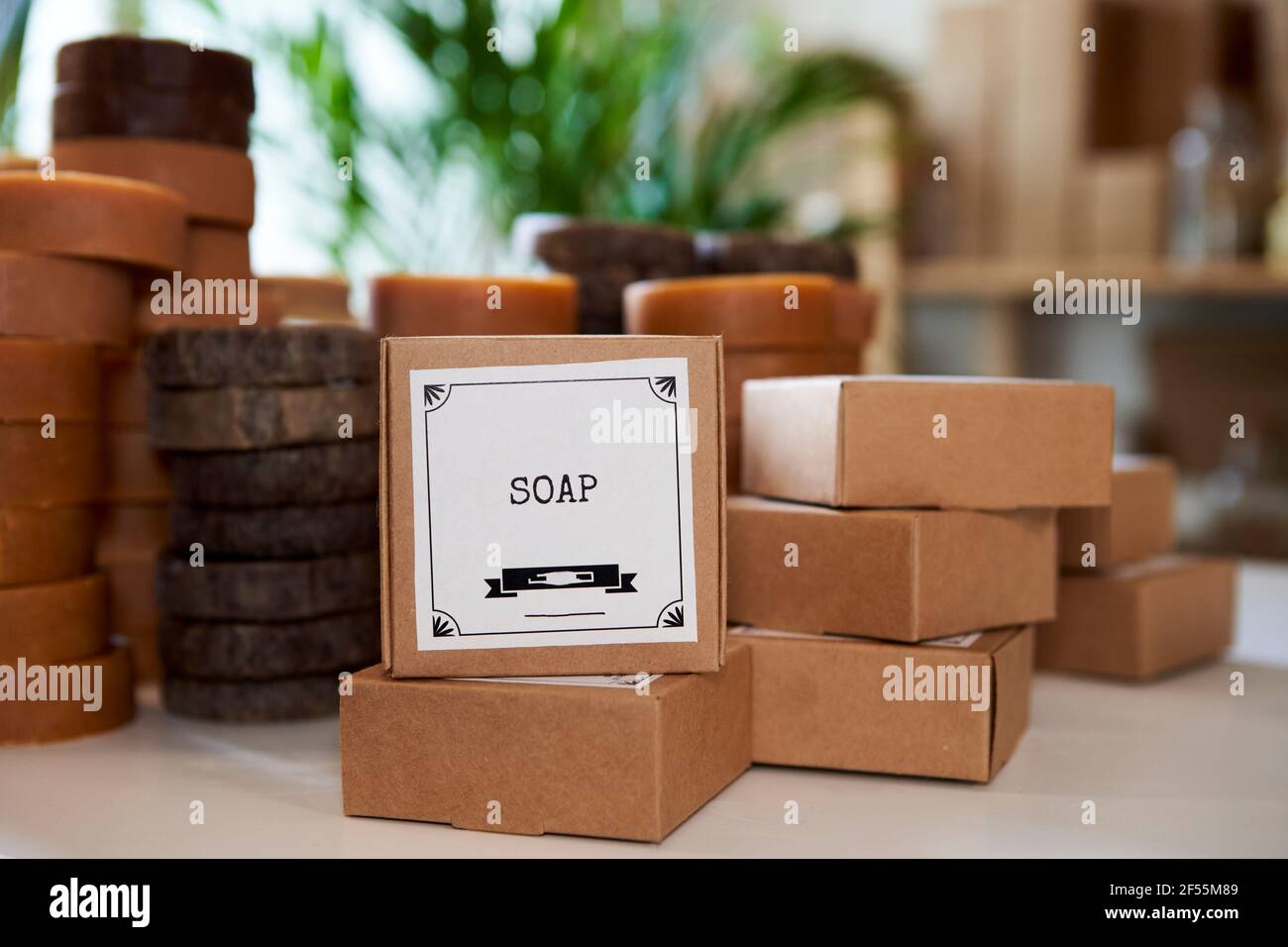 Arrangement of handmade soap boxes at workshop Stock Photo - Alamy