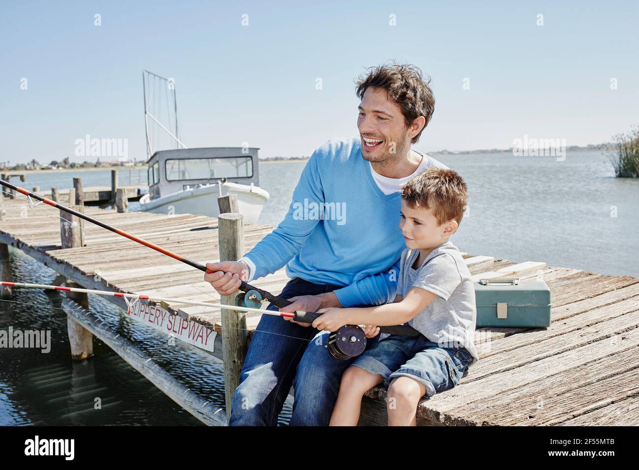Father children fishing hi-res stock photography and images - Alamy