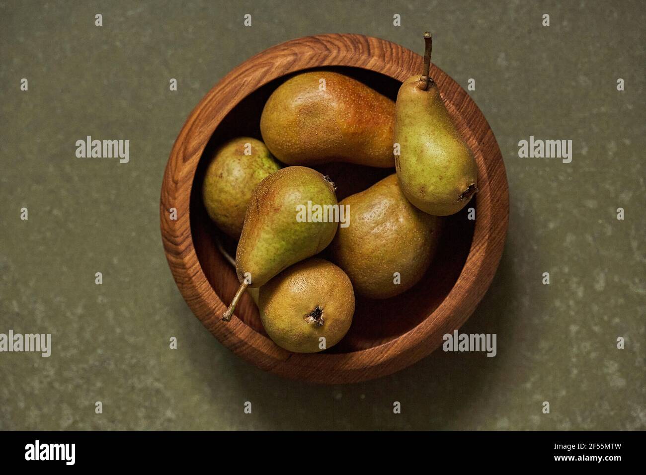Ripe pear in bowl hi-res stock photography and images - Alamy