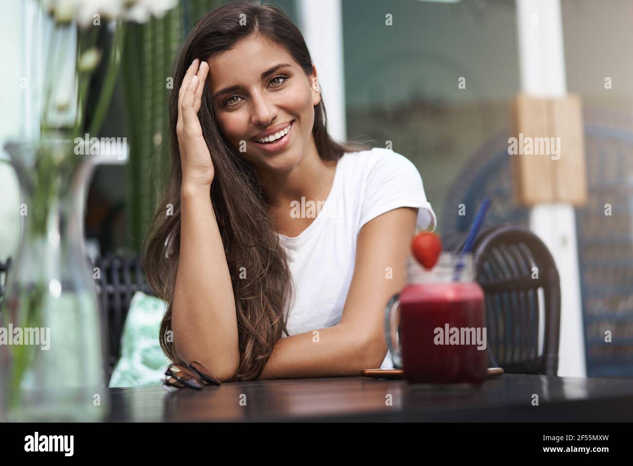 Entertained attractive girlfriend laughing happily touch haircut flirty ...