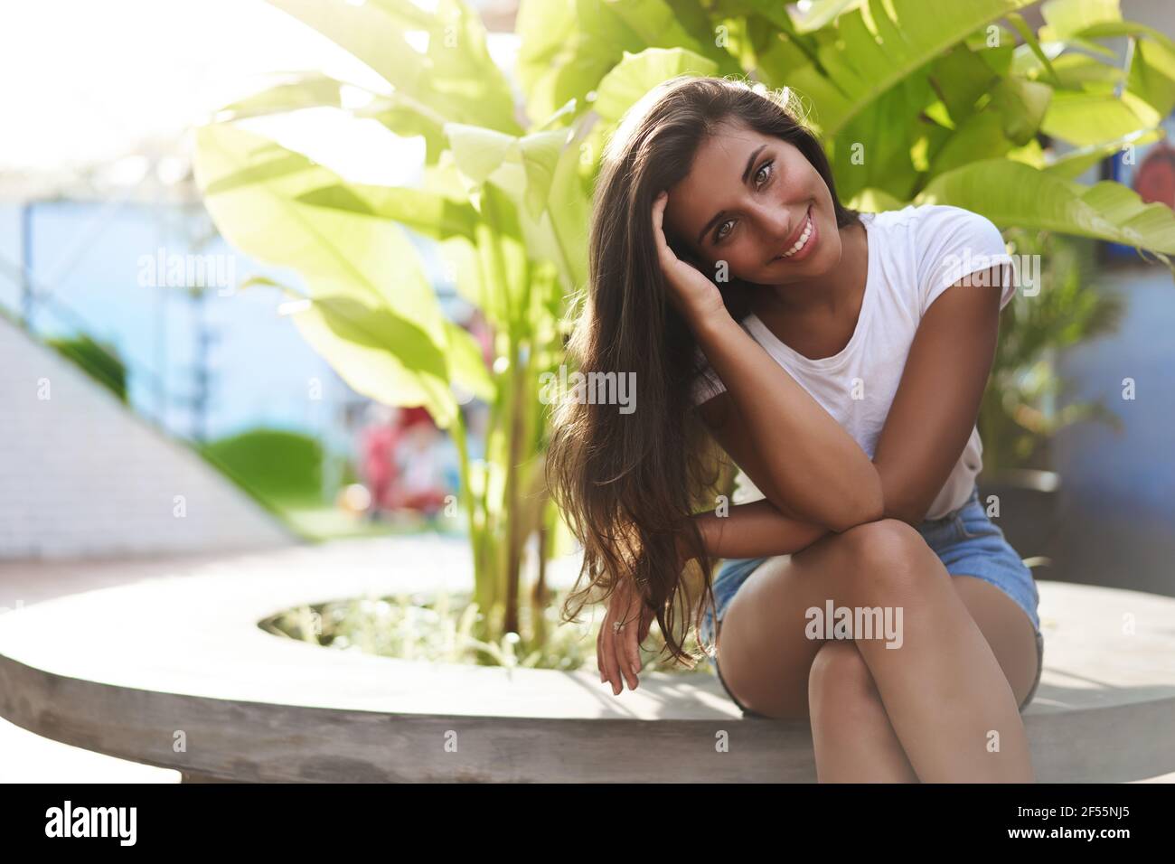 Attractive sensual tanned brunette woman vacation enjoy travel warm ...