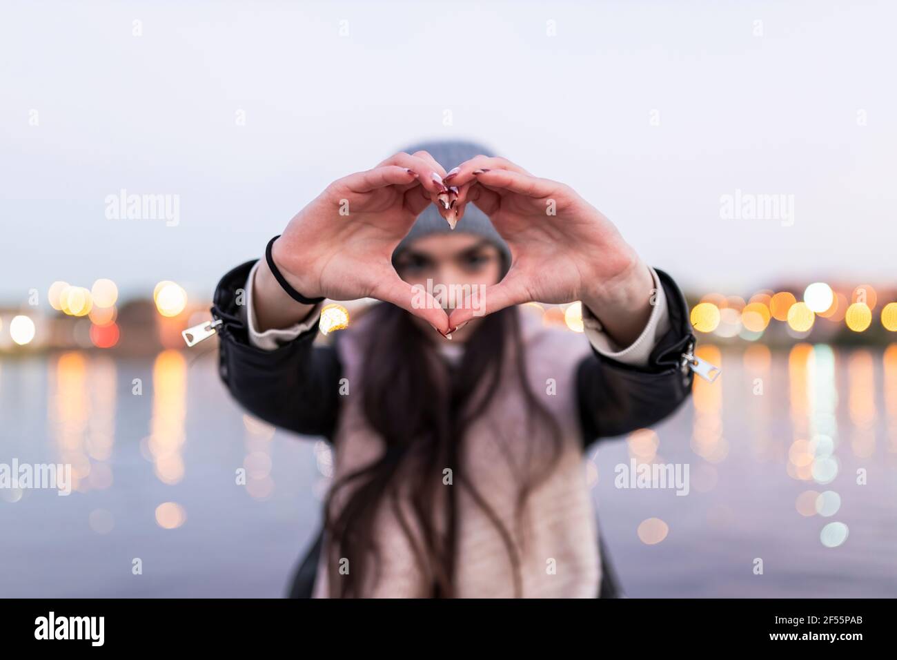 Hands doing heart sign High Resolution Stock Photography and Images - Alamy