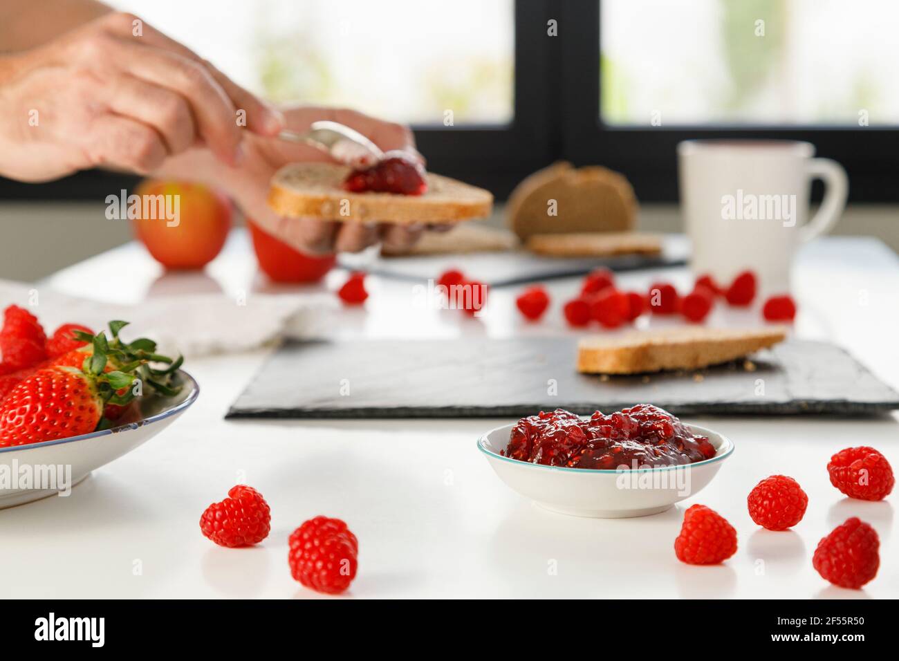 Hand knife sliced bread hi-res stock photography and images - Alamy