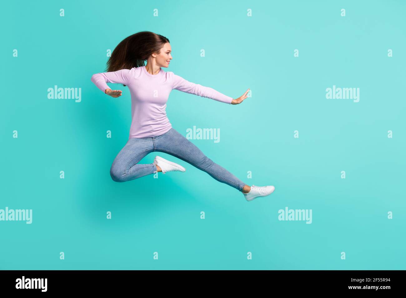 Full length body size view of attractive girl jumping fighting dancing ...