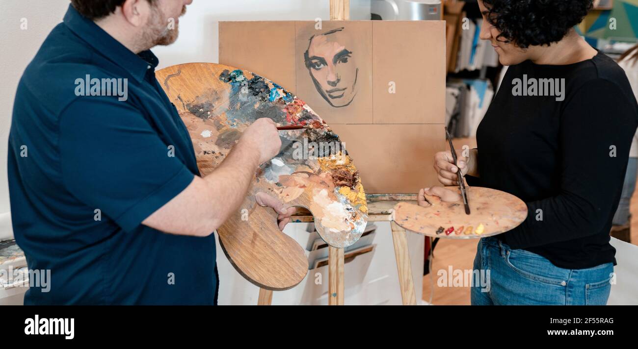 Male female learning hi-res stock photography and images - Alamy