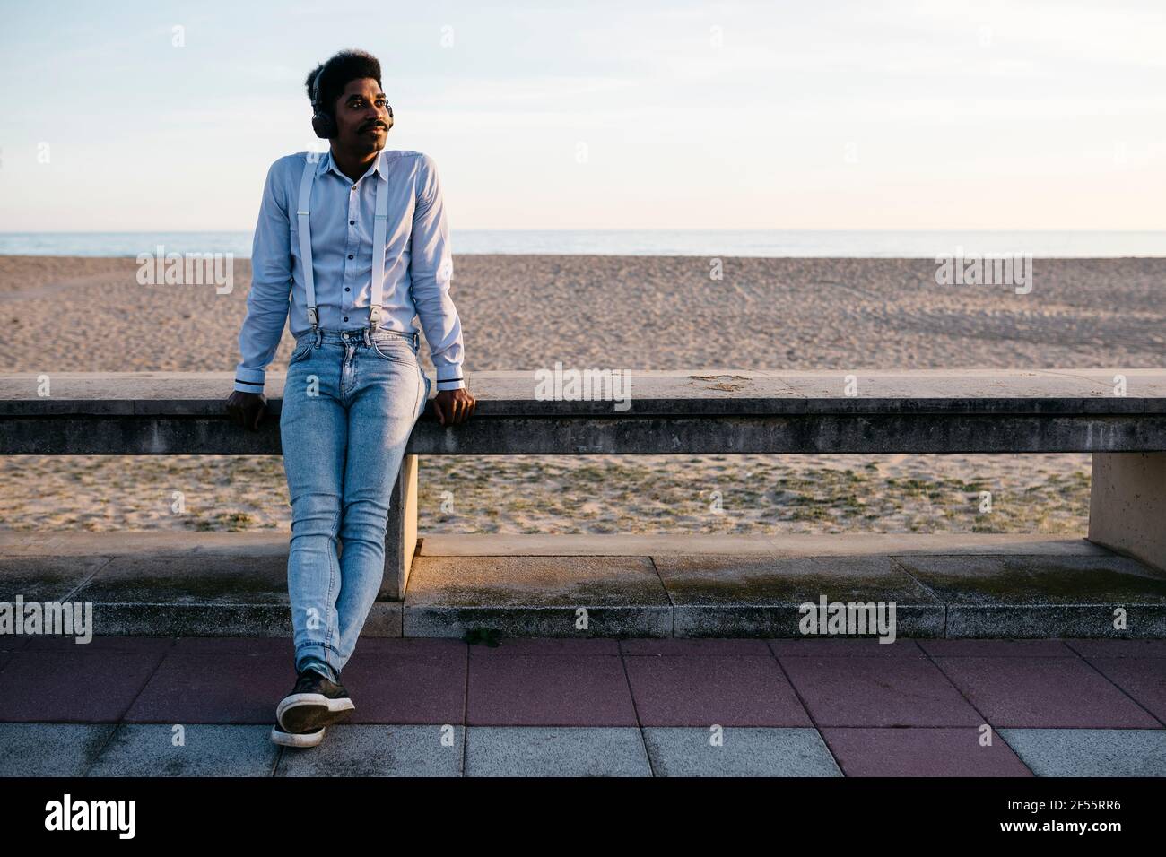 Guy Sitting Against Wall