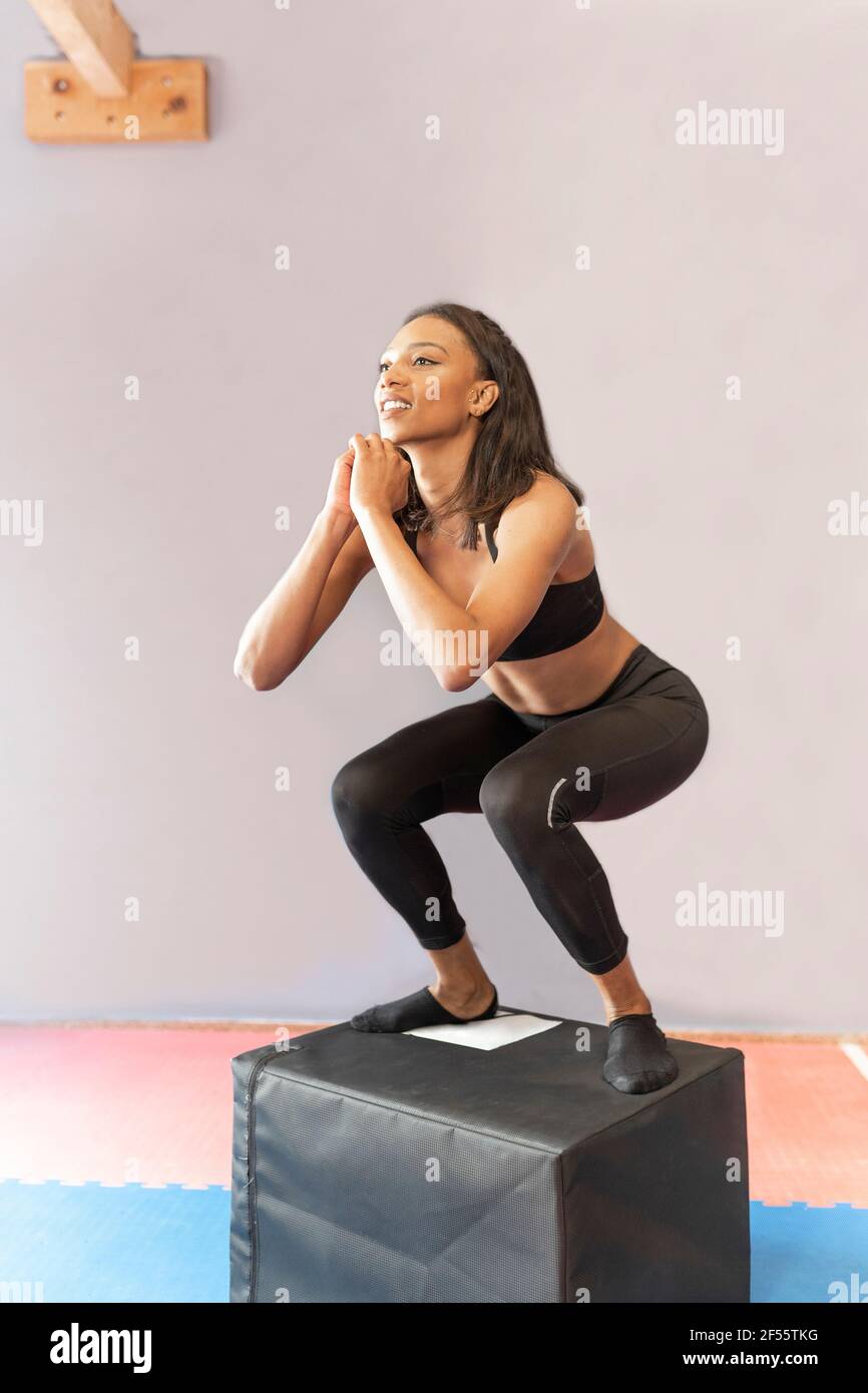 Squat box jump hi-res stock photography and images - Alamy