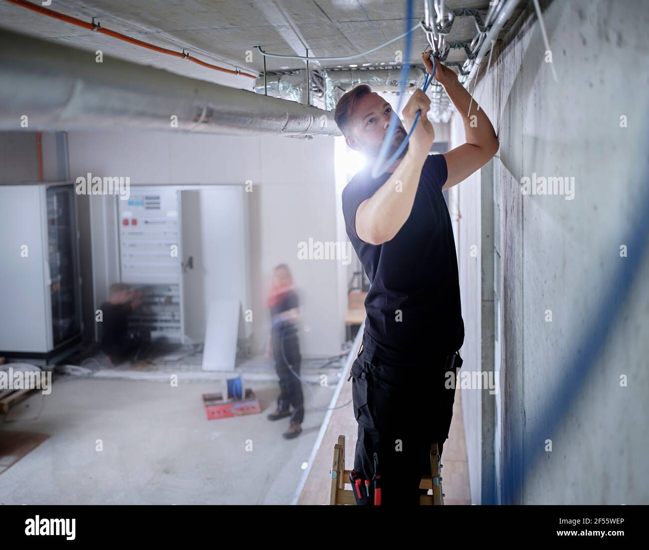 Installing cables hi-res stock photography and images - Alamy