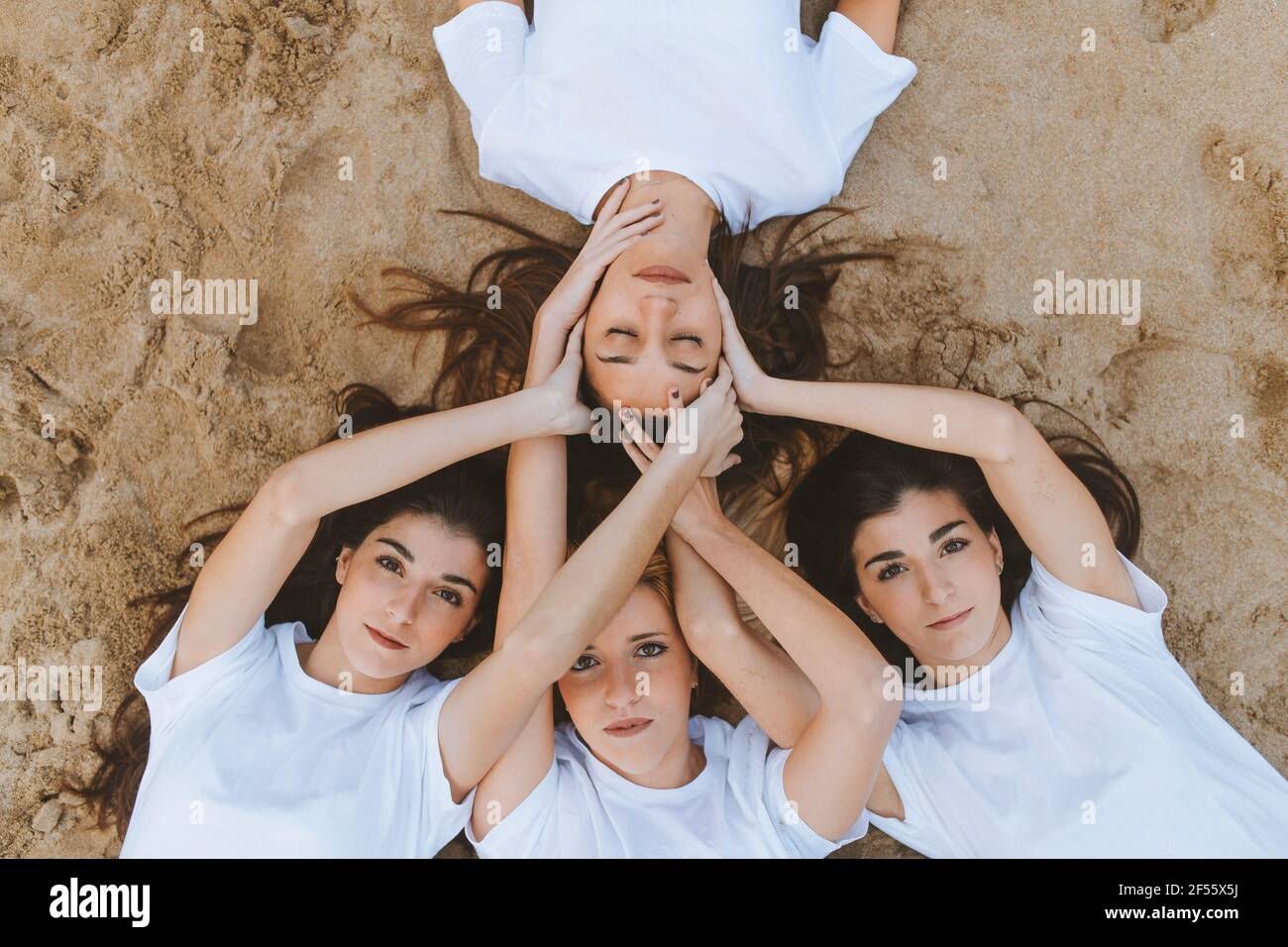 Women touching hi-res stock photography and images - Alamy