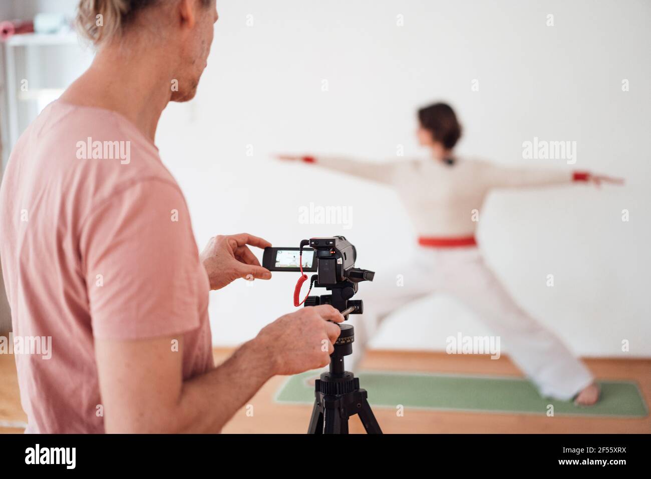 Filming camera man studio full length hi-res stock photography and ...