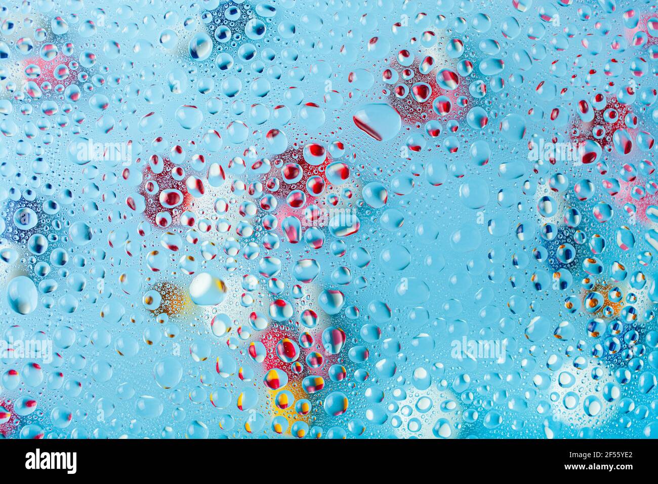 pill tablet capsule medicine through water drops background Stock Photo ...