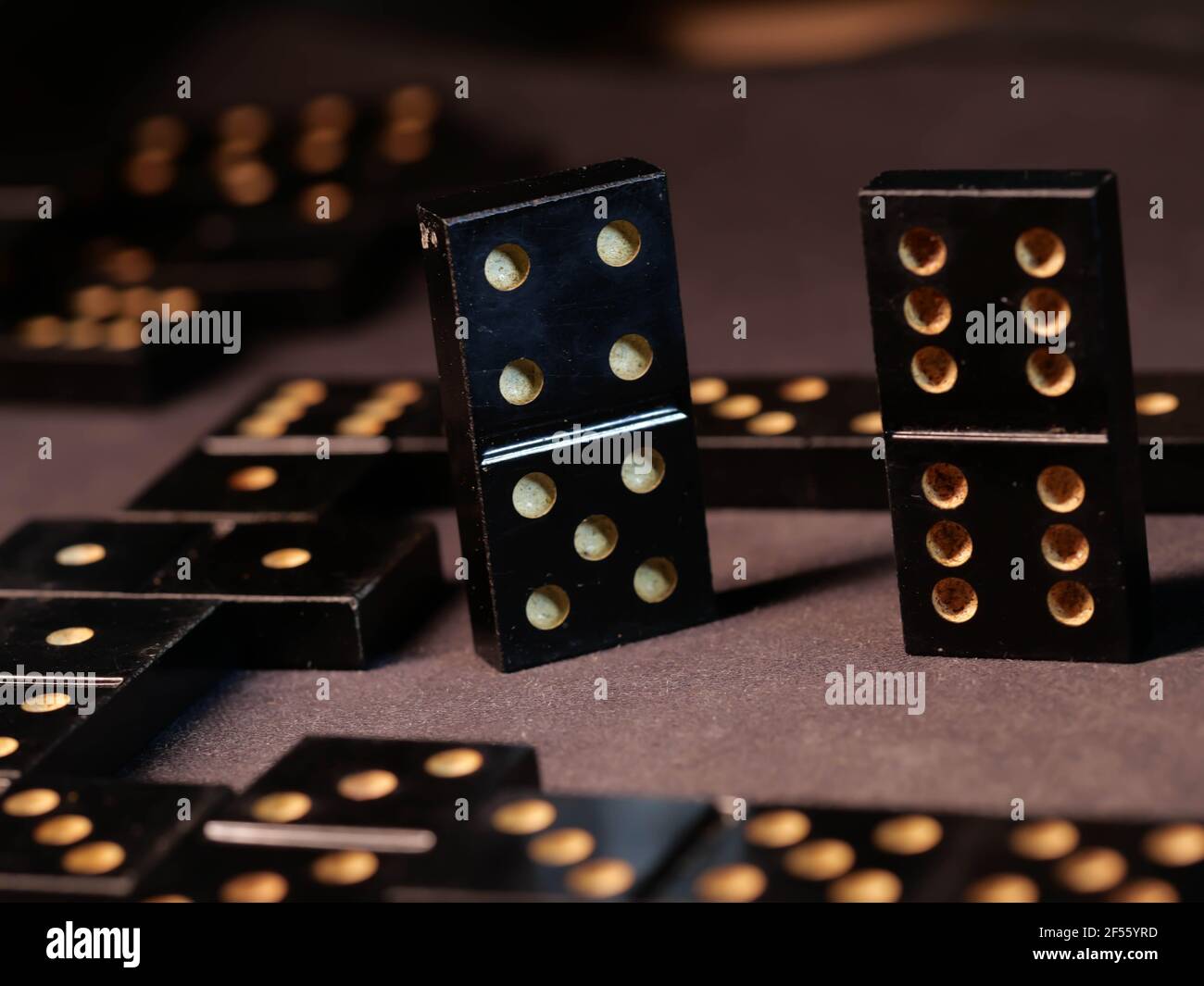 Domino formed in different ways, black, on white background. Each piece ...