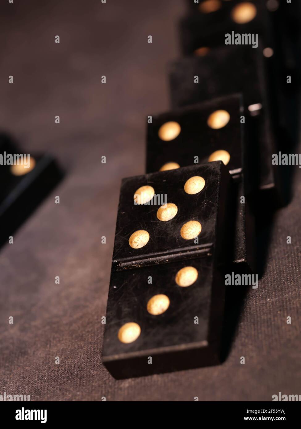 Domino formed in different ways, black, on white background. Each piece ...