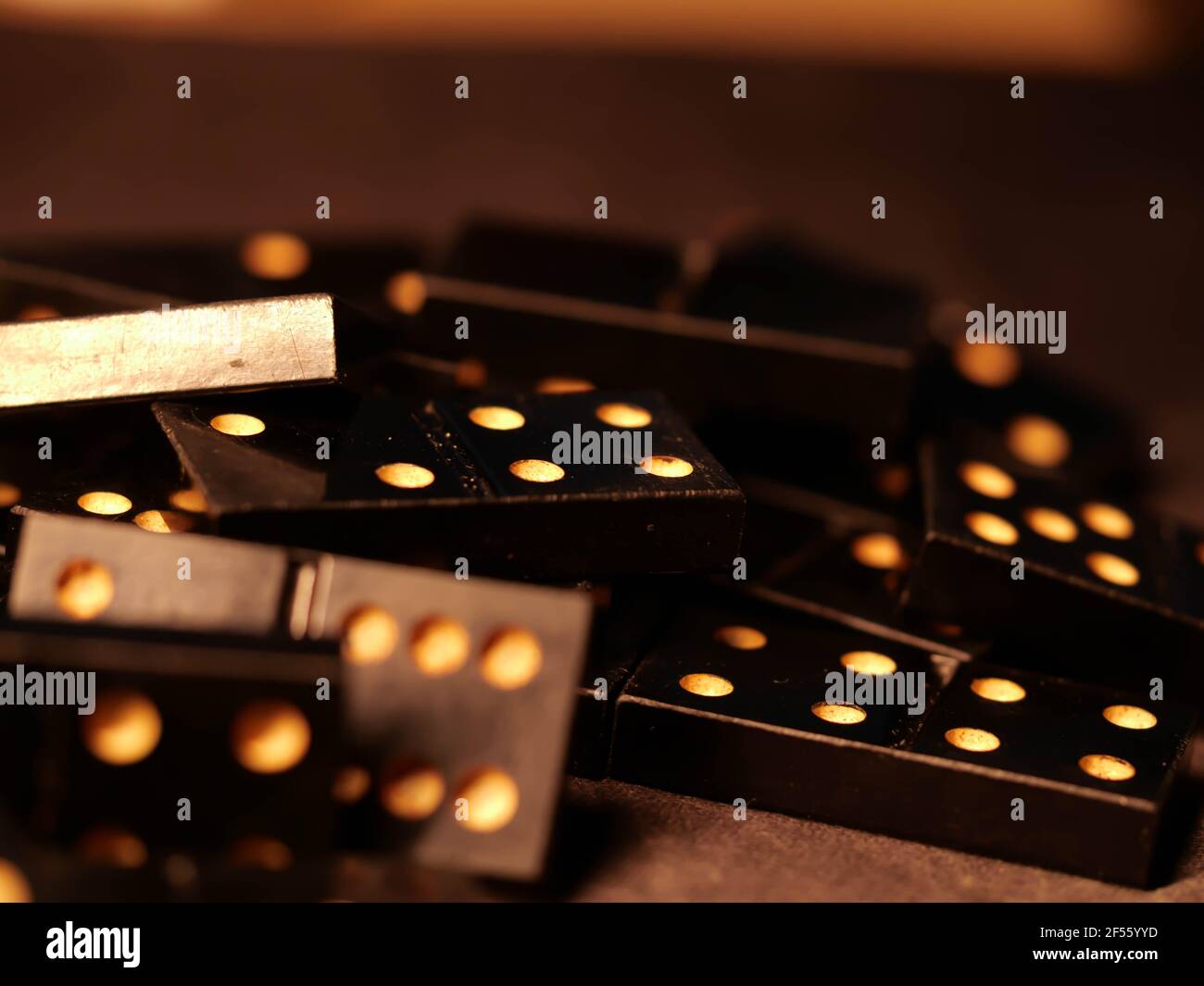 Domino formed in different ways, black, on white background. Each piece ...