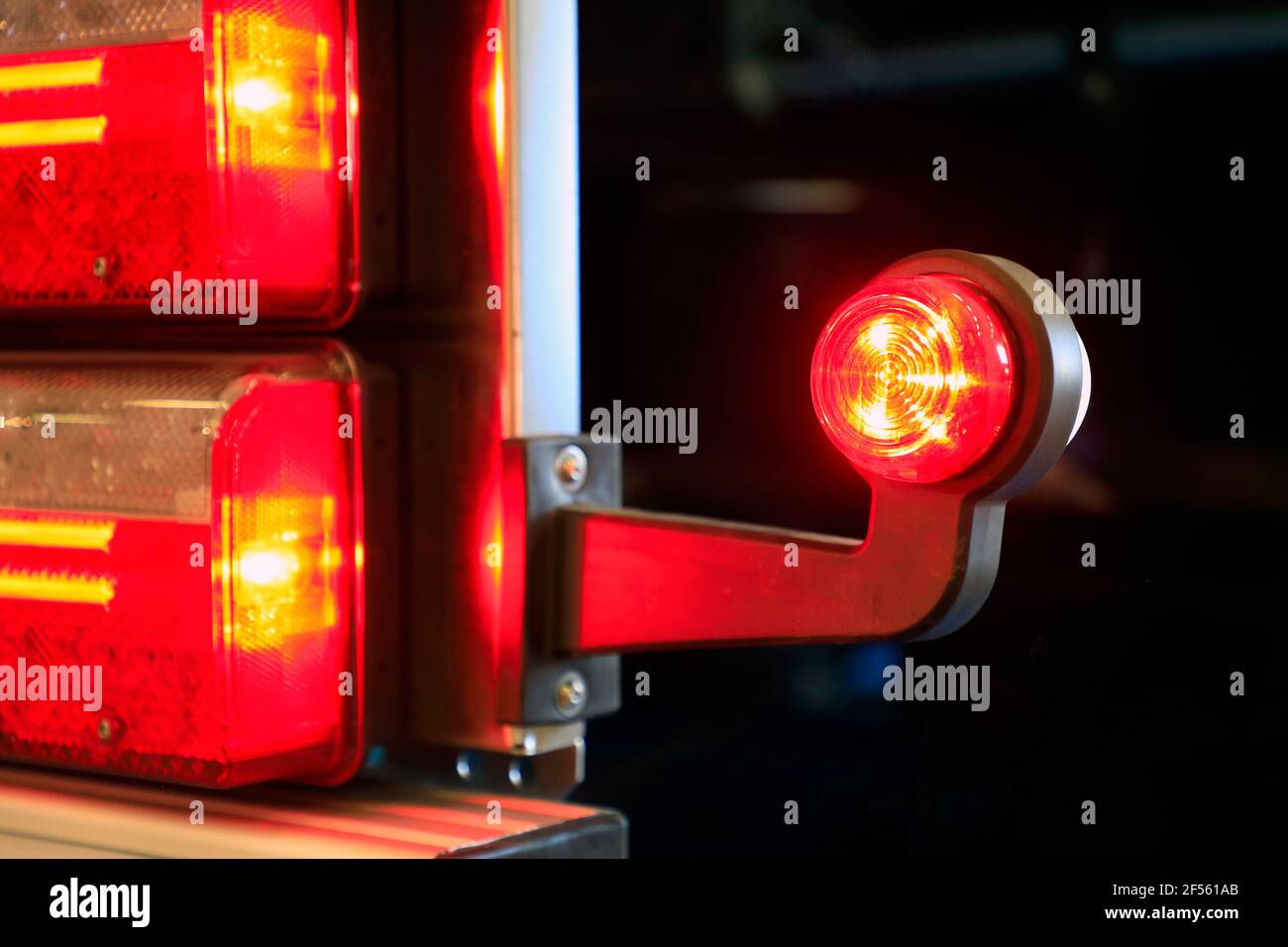 Illuminated heavy freight truck tail light, detail. No branding visible ...