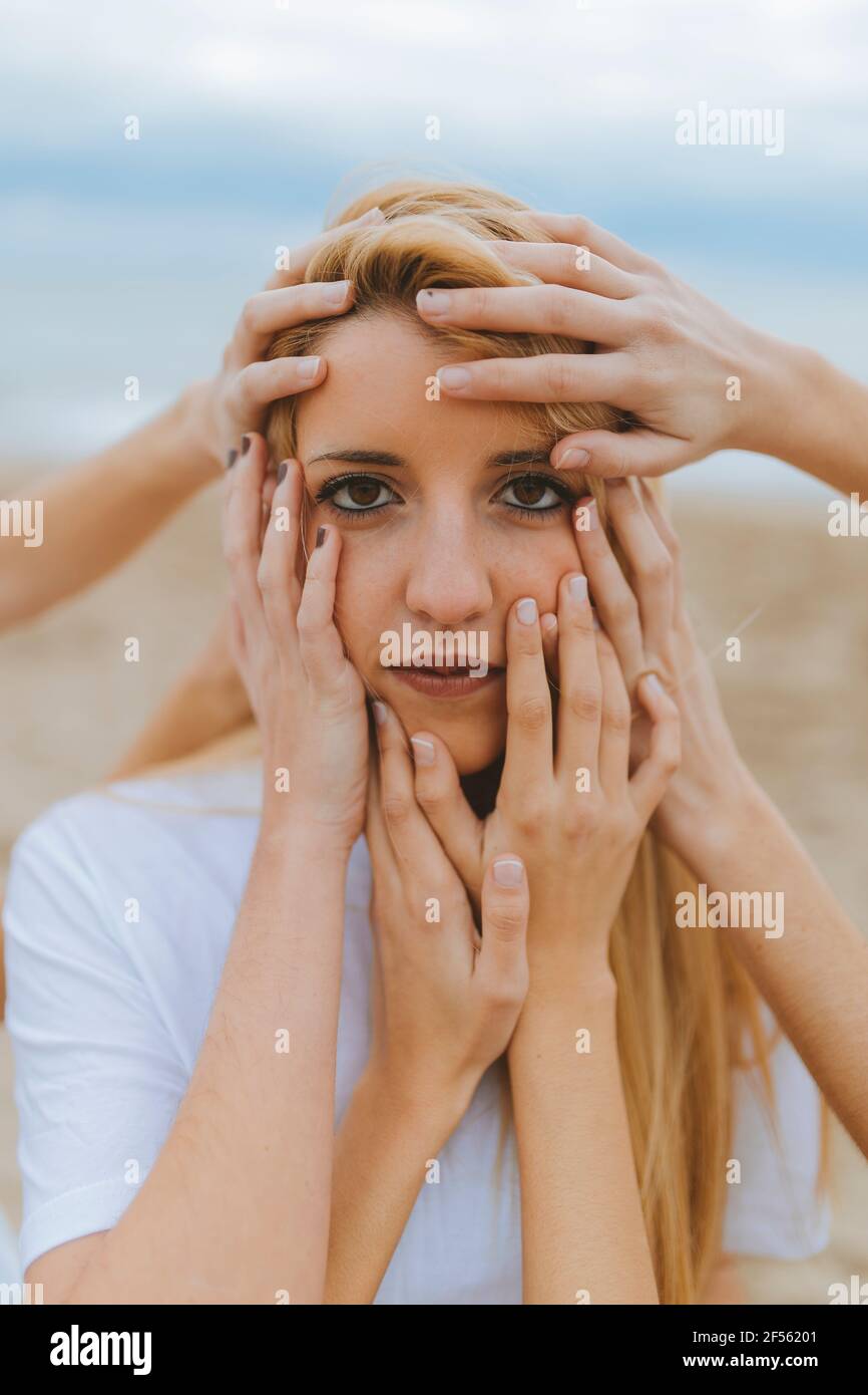 Woman beauty hands face hi-res stock photography and images - Alamy