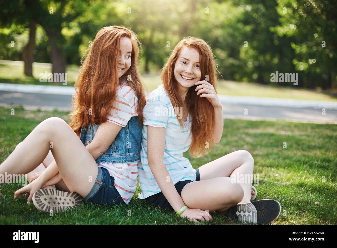 Girls chilling in park, feeling happy without any worries. Cute ...