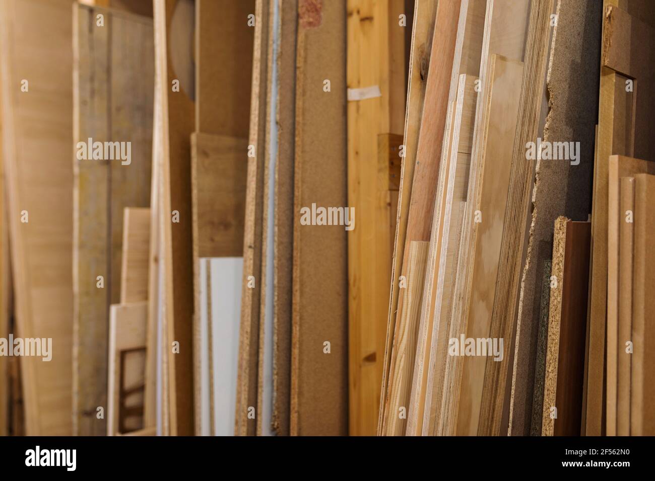 Wooden planks in workshop Stock Photo - Alamy