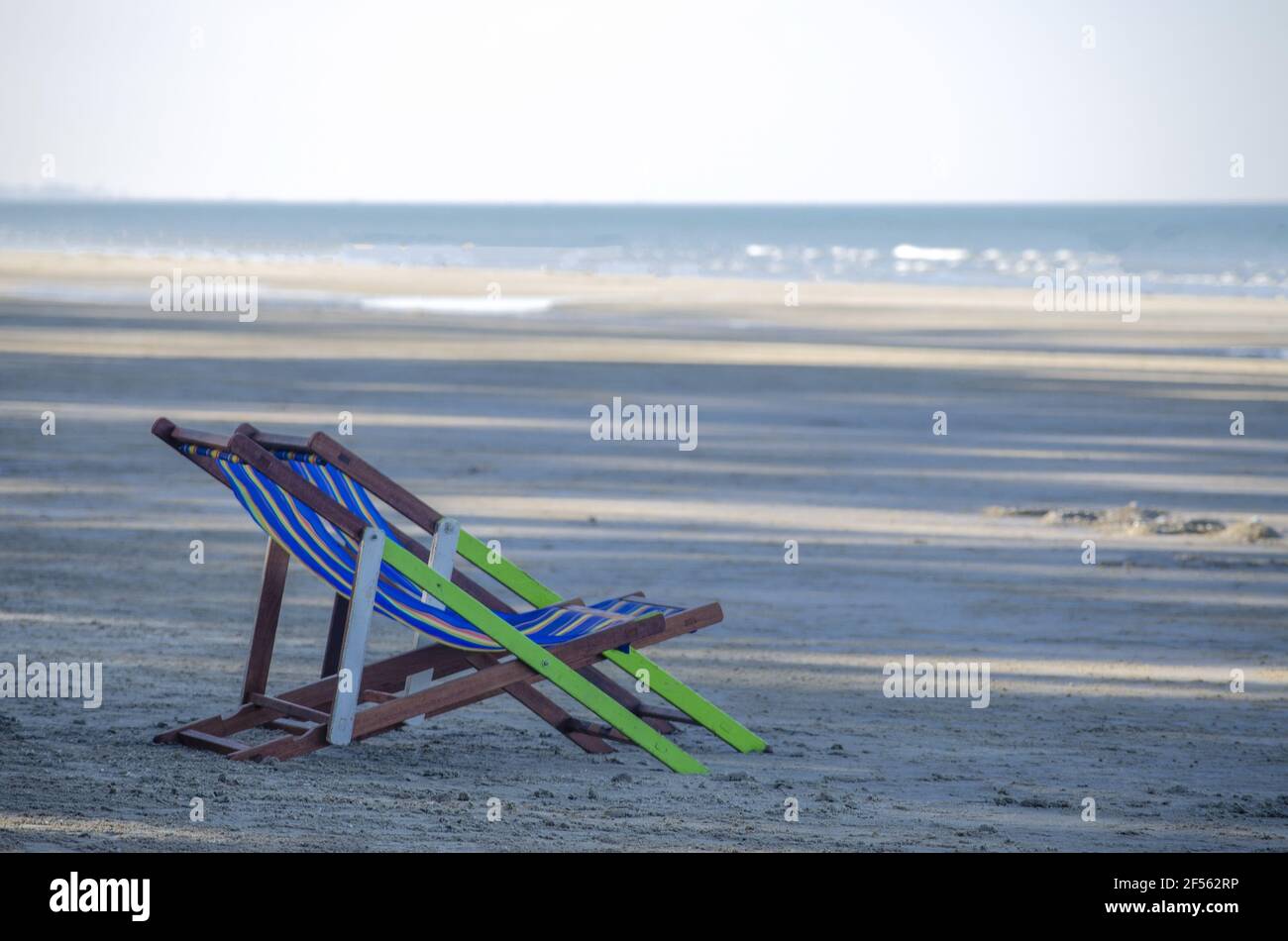 Semi-reclining chair for relaxing on the beach Stock Photo - Alamy