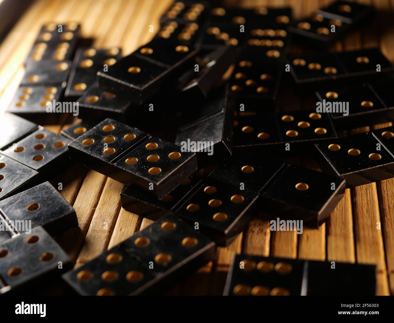 Domino formed in different ways, black, on white background. Each piece ...