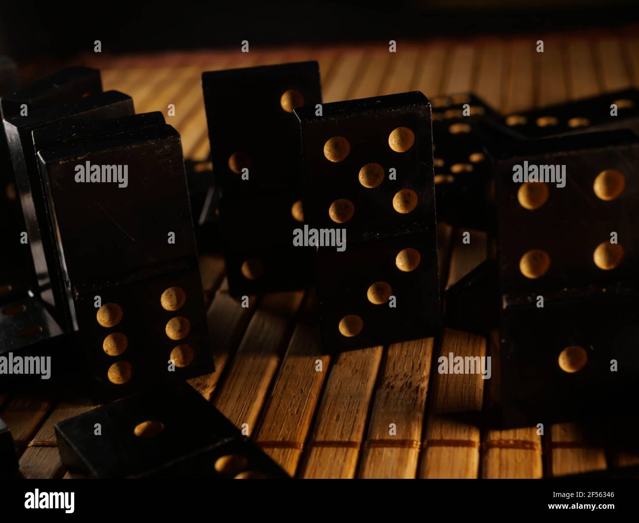 Domino formed in different ways, black, on white background. Each piece ...