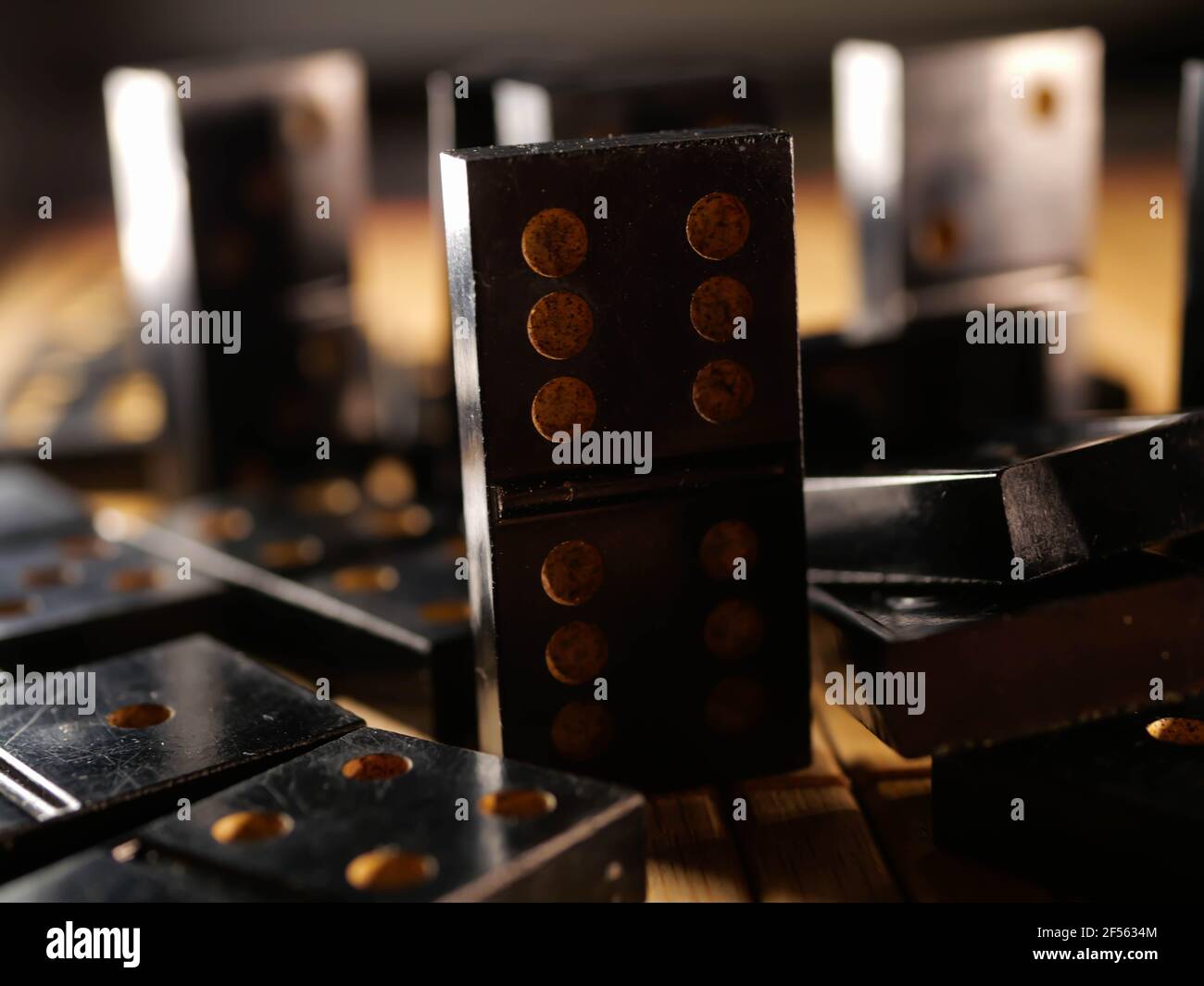 Domino formed in different ways, black, on white background. Each piece ...